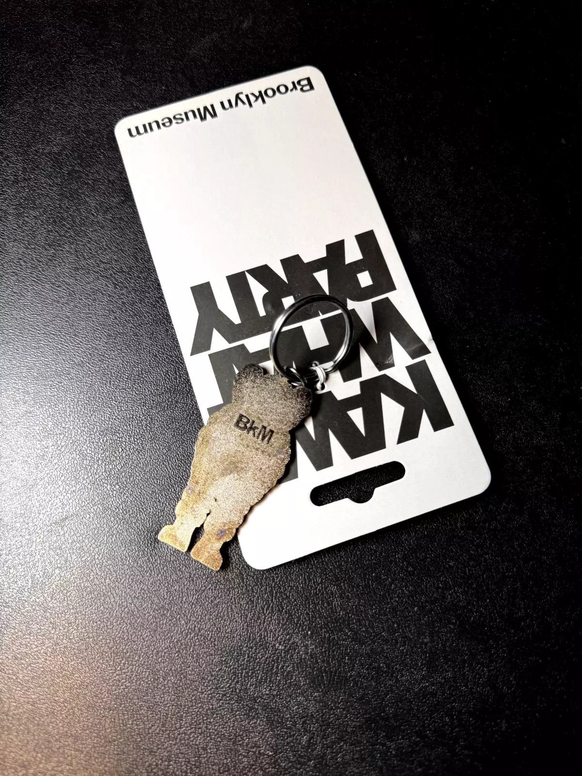 Kaws KAWS x BROOKLYN MUSEUM WHAT PARTY KEY CHAIN ORANGE | Grailed