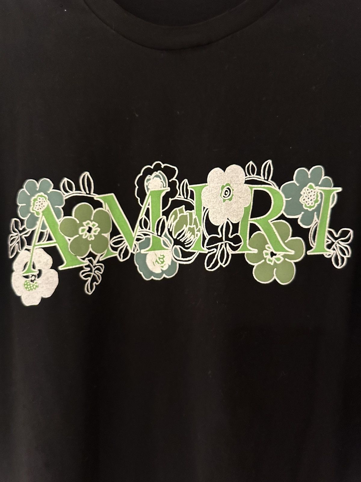 Amiri Amiri flower Print black logo T shirt | Grailed