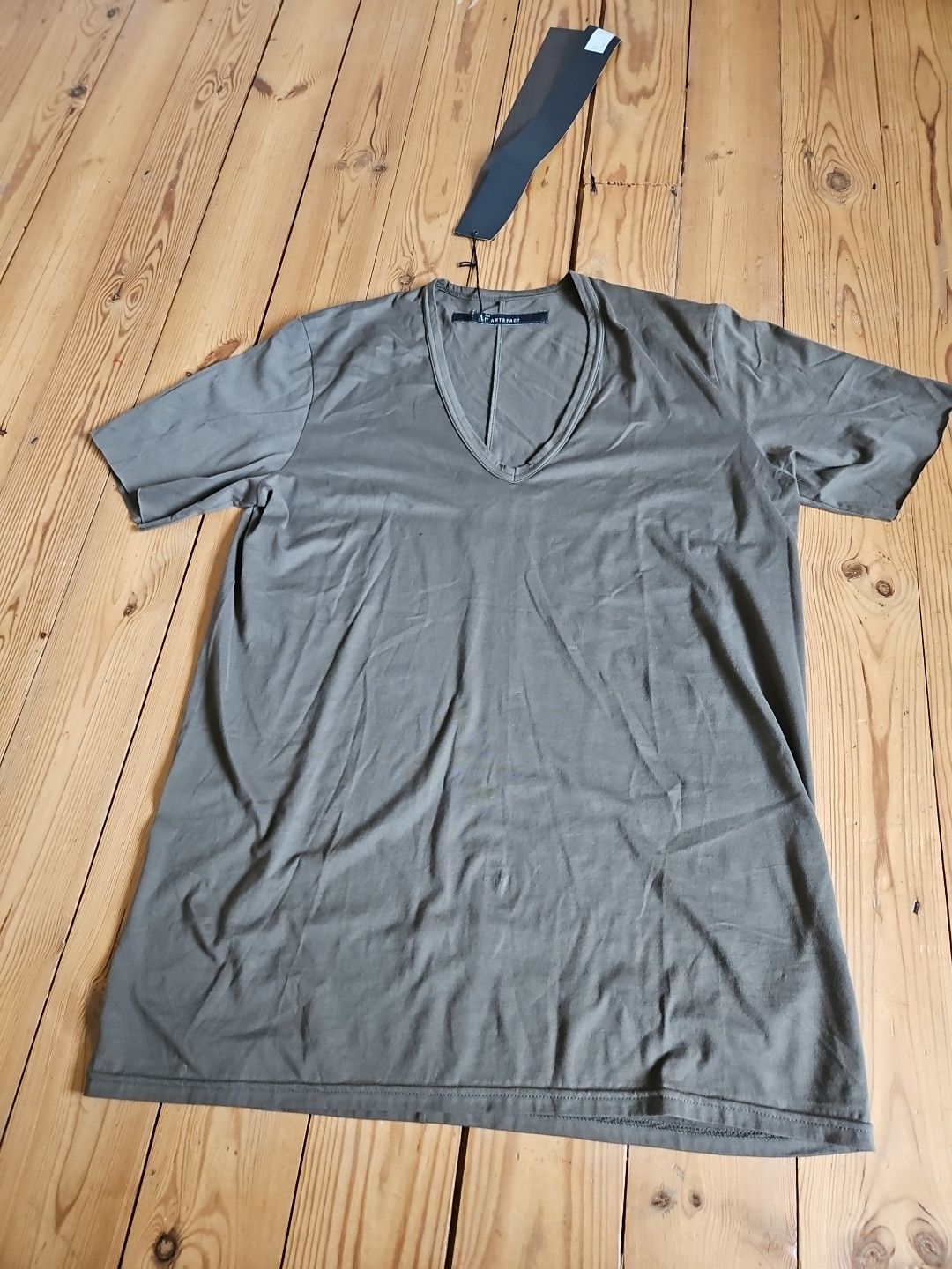 A.F. Artefact AF Artefact deep V dark green T shirt | Grailed