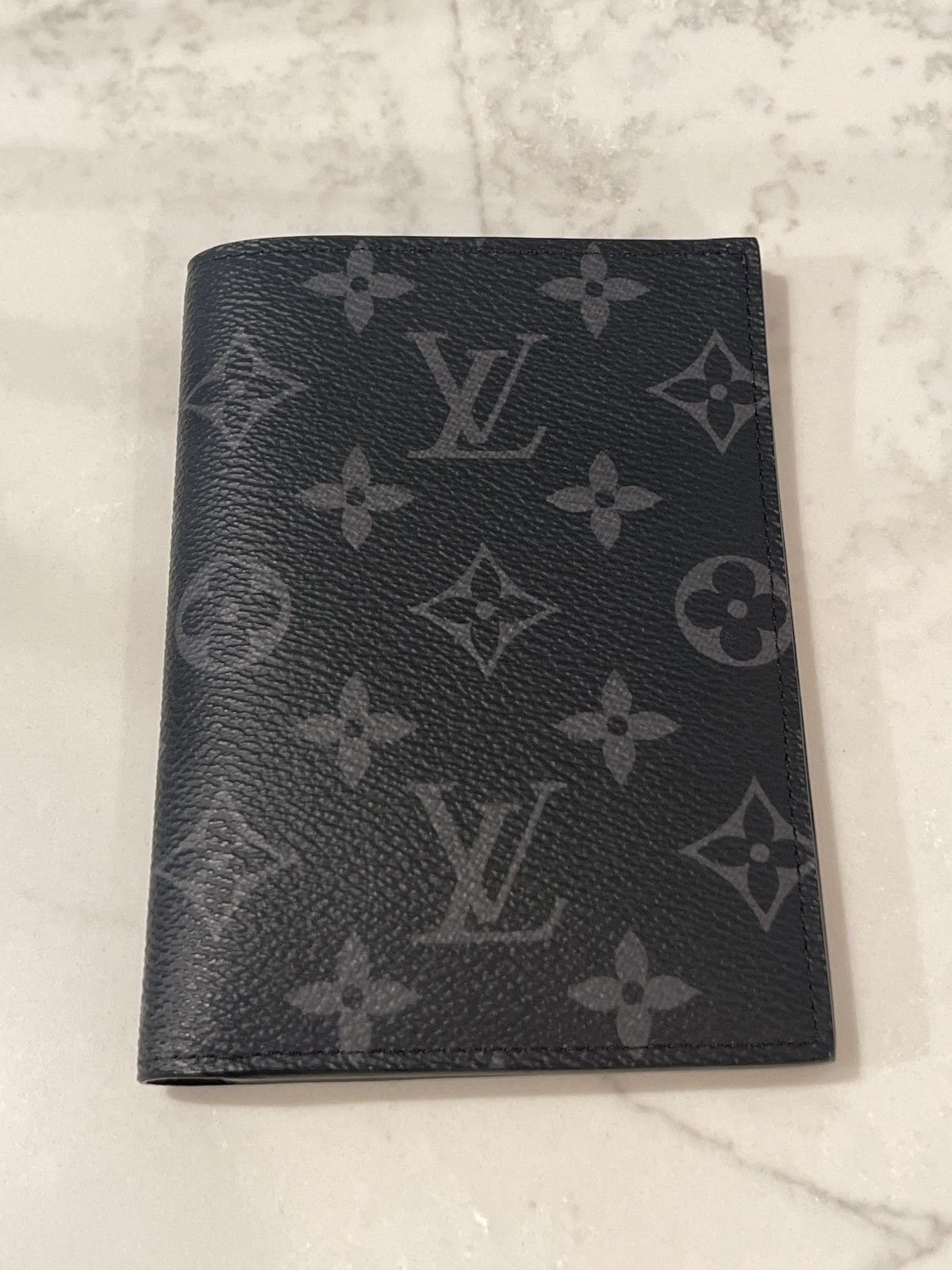 Louis Vuitton Louie V Passport Wallet | Grailed