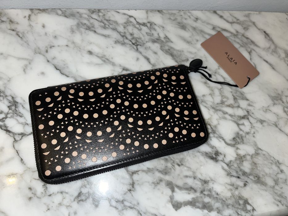 Alaia NEW Alaïa zipped companion wallet in black and sand leather | Grailed