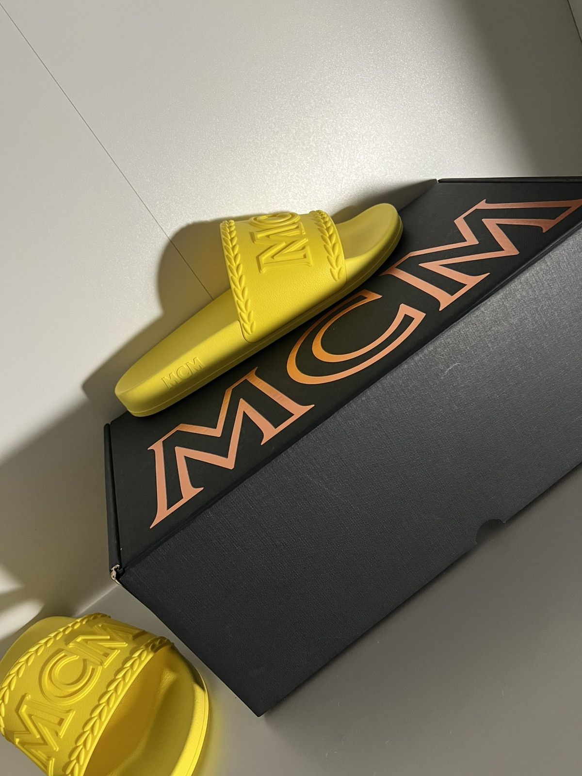 MCM MCM YELLOW SLIDES | Grailed