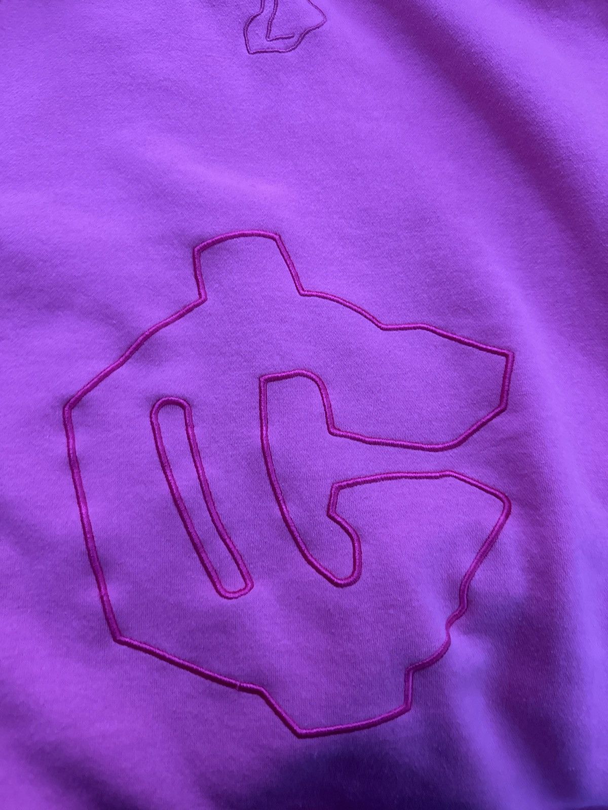 Thirteen Studios pink condome hoodie | Grailed