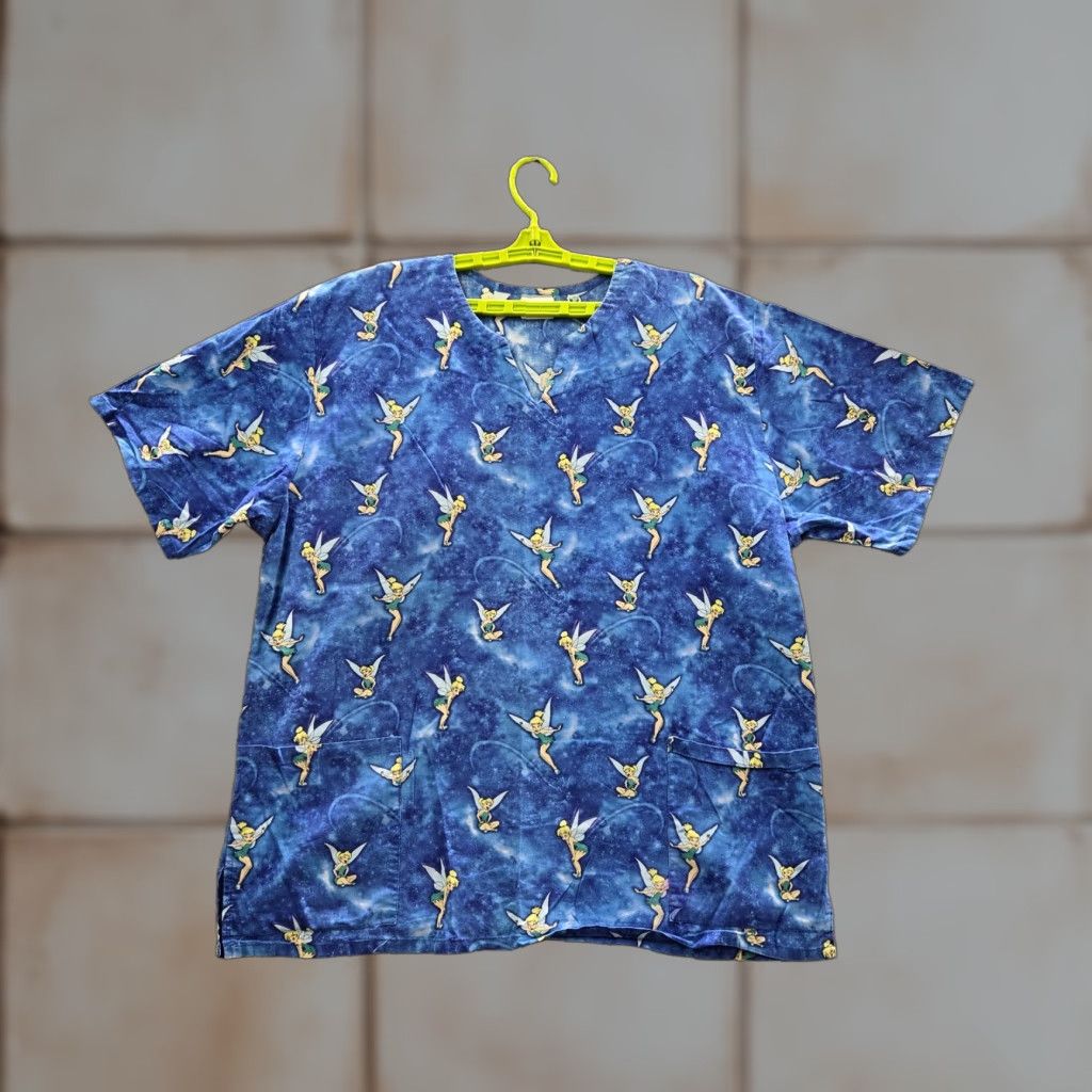 Disney Barco Uniforms Disney Women Scrub Top L Blue Graphic Tinker Bell ...