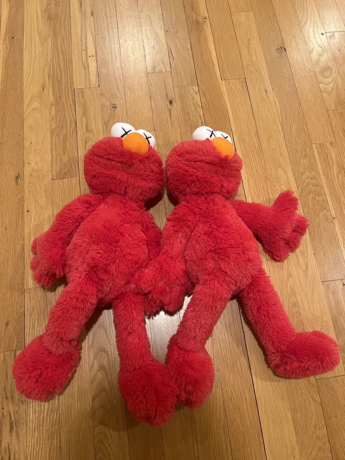Designer × Kaws × Uniqlo Kaws Elmo Plushes Set Of 2 | Grailed
