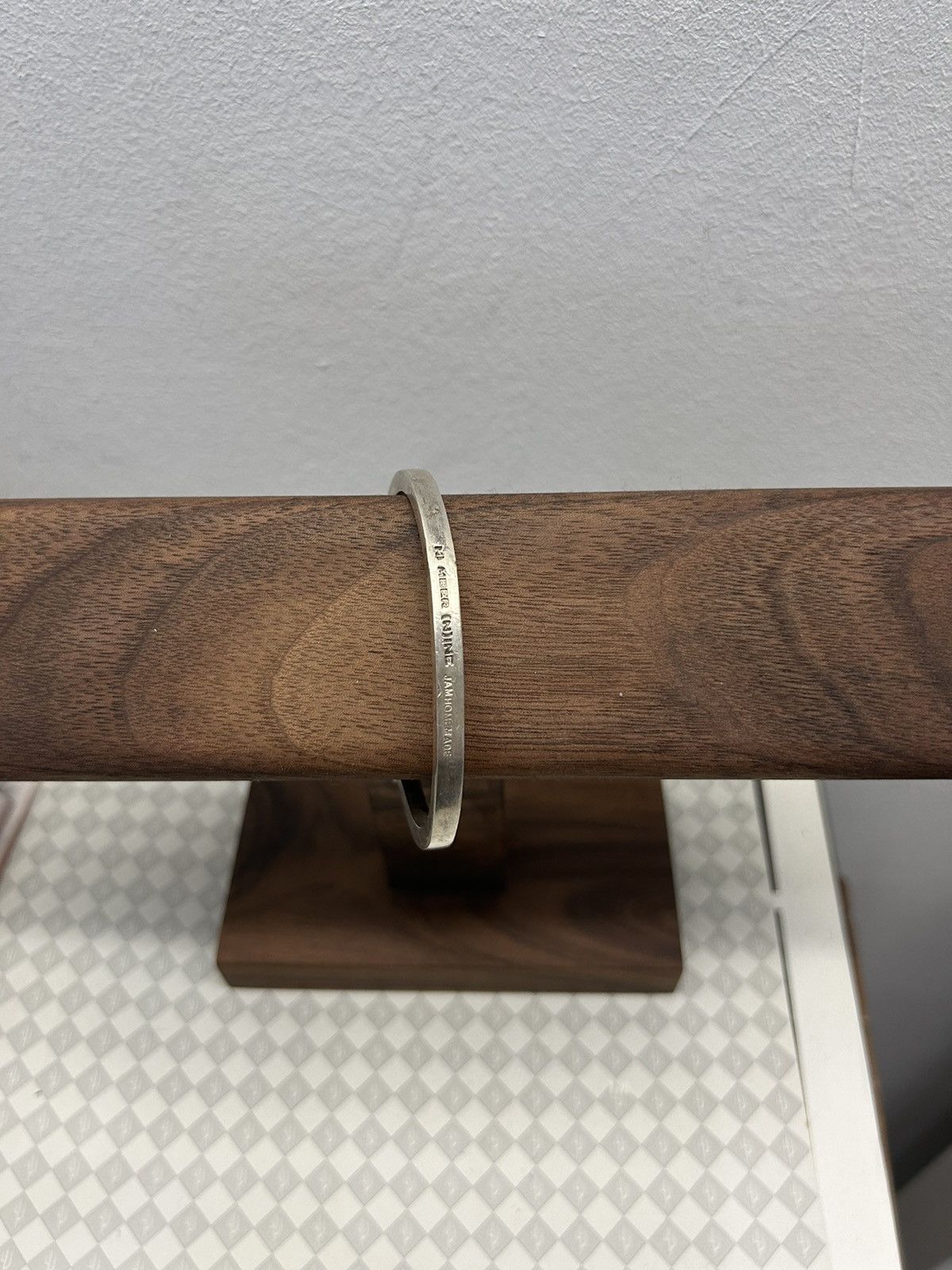 Number (N)ine Number skull slogan recycled silver bracelet | Grailed