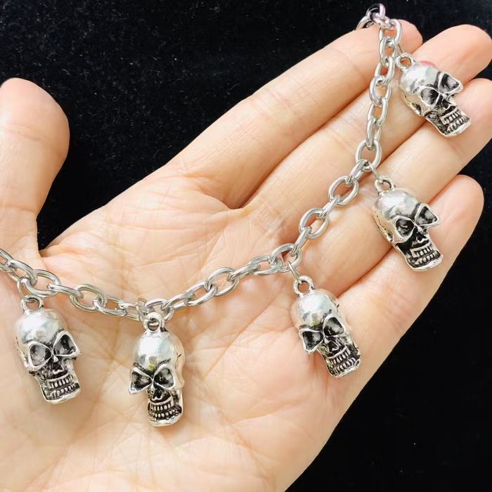 Handmade sick skulls pendants featured on cross link chain | Grailed