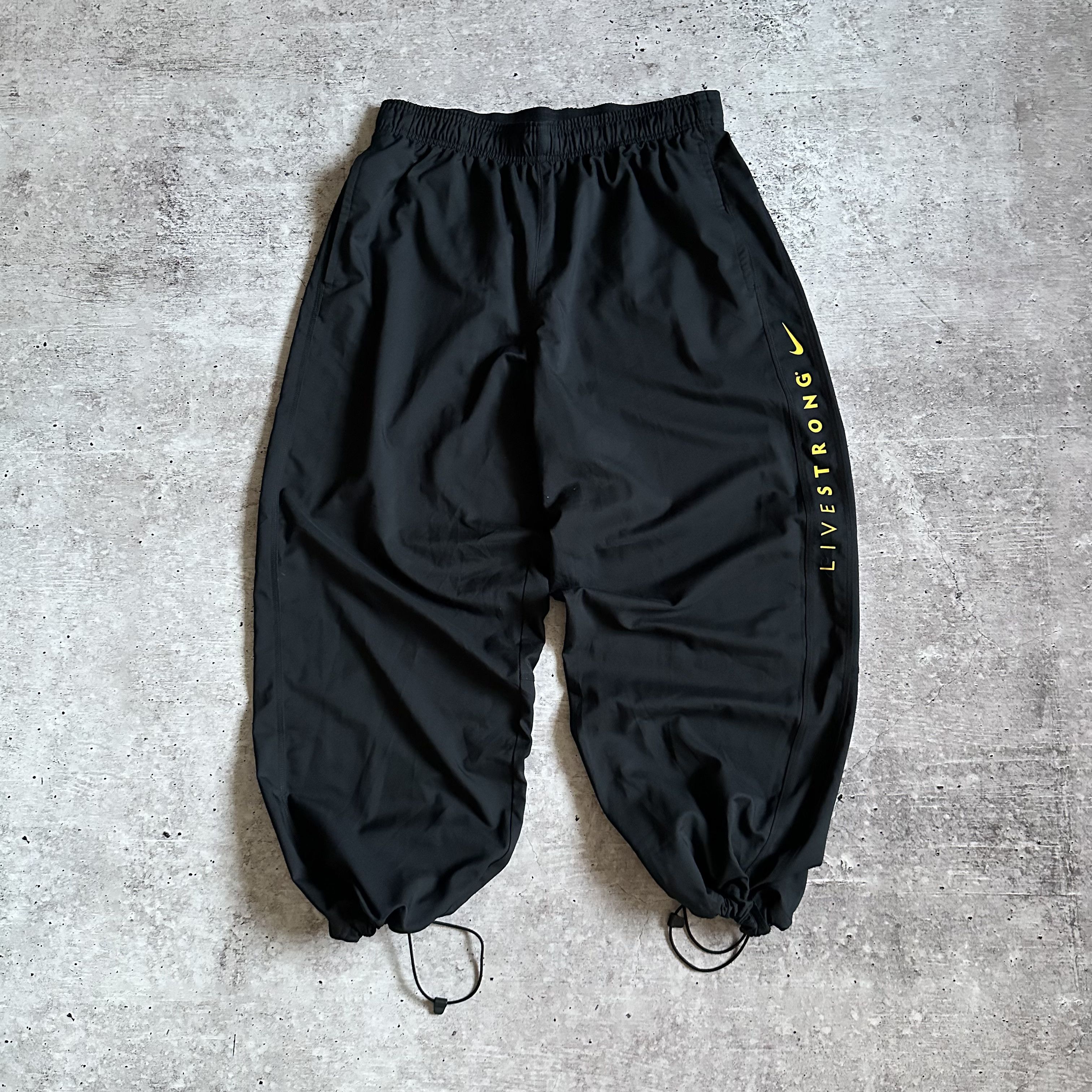 Nike NIKE YELLOW SWOOSH LOGO BAGGY NYLON DRILL TRACK PANTS | Grailed