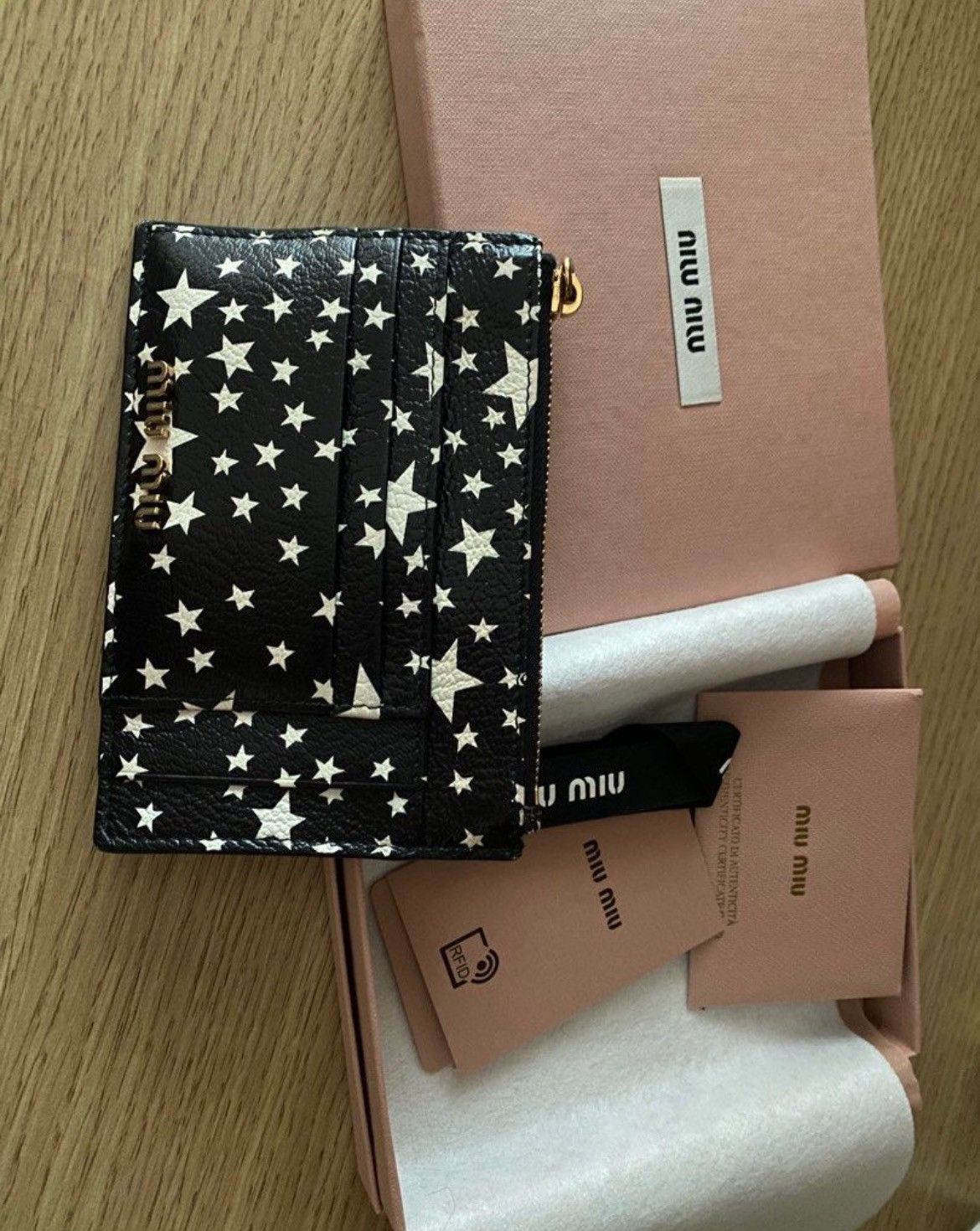 Miu Miu Miu Miu card holder | Grailed