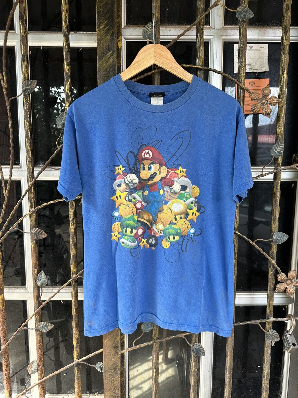 Vintage Vintage Super Mario Nintendo game series promo tees | Grailed