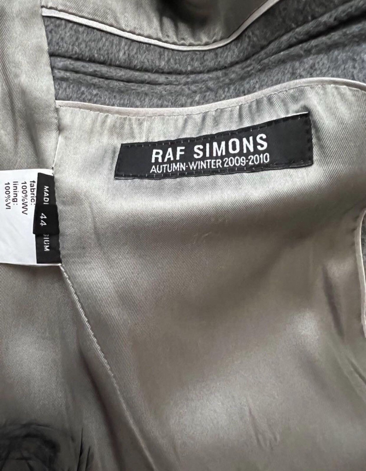 Raf Simons Raf Simons 09AW mirror embedded initial shearing wool coat ...