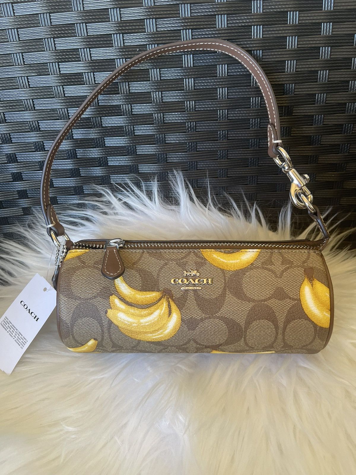 Coach Coach Nolita Barrel Bag In Signature Canvas With Banana Print ...