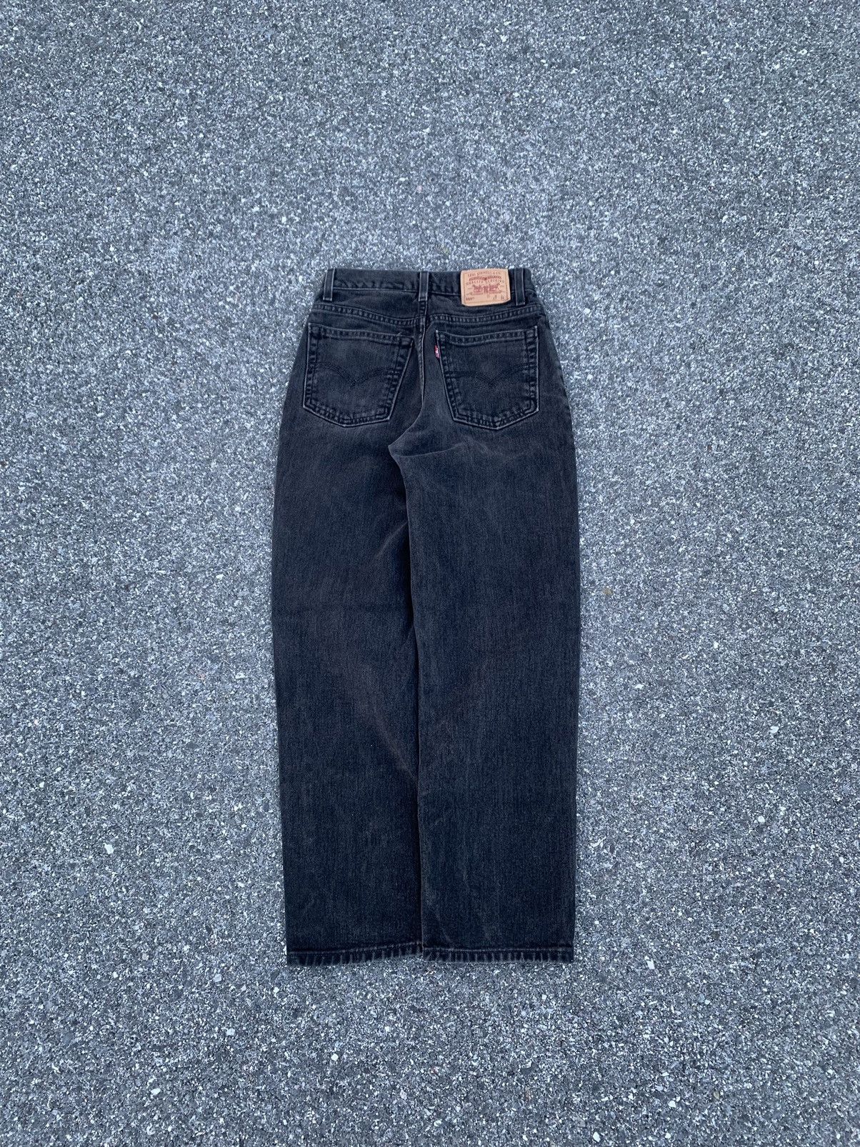 Vintage Vintage faded black 2000s Levi’s 550 jeans | Grailed