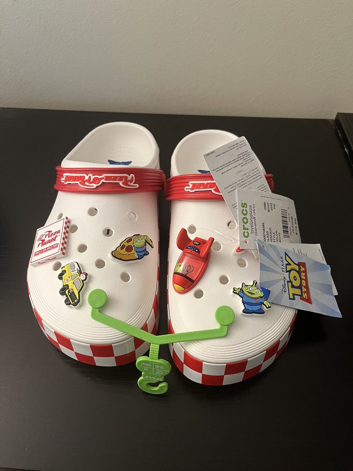 Crocs Crocs x Toy Story Pizza Planet | Grailed