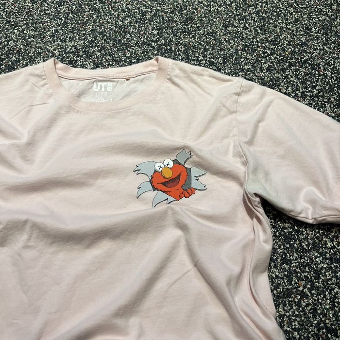 Kaws Kaws Sesame Street Light Pink Elmo T-Shirt | Grailed