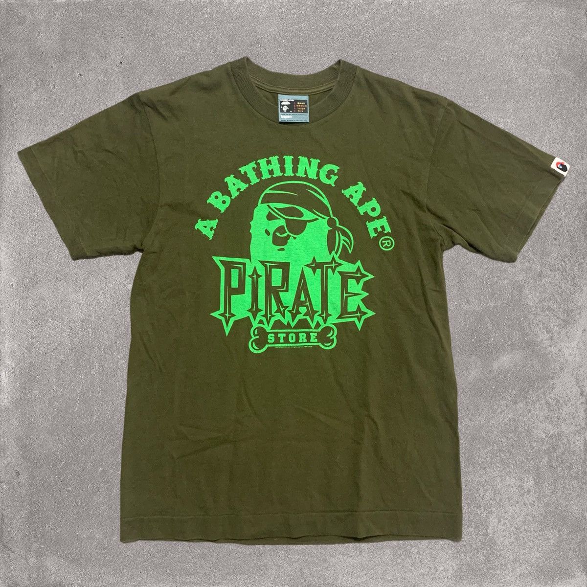 Bape Bape Small Pirate Store Green A Tee A Bathing Ape 2010 | Grailed