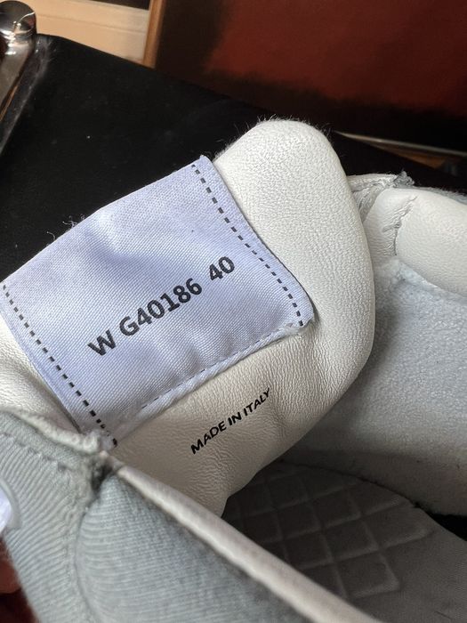 Chanel chanel logo runner sneakers grey | Grailed